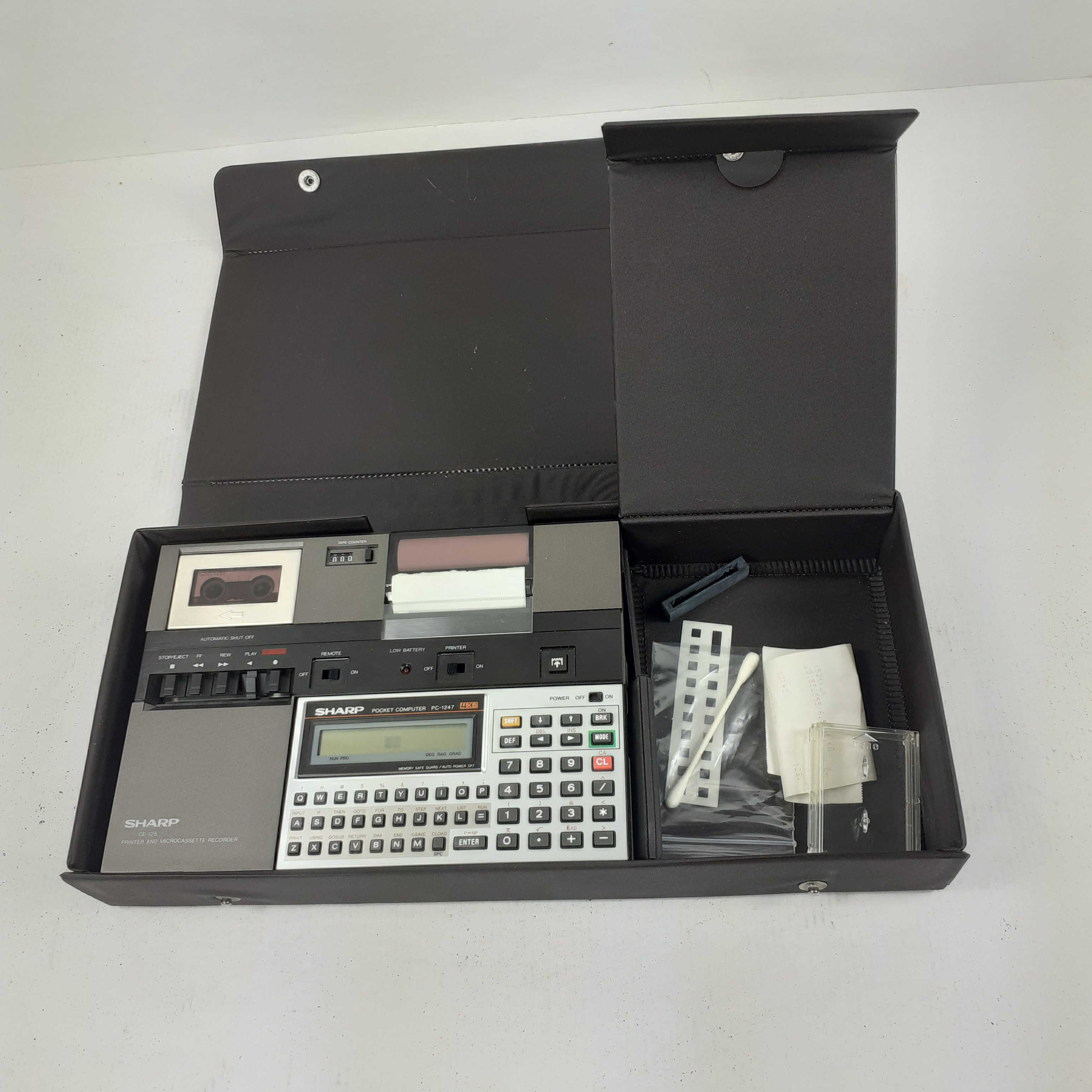 ordinateur de poche vintage SHARP PC 1247 complet avec unité CE 125 ...